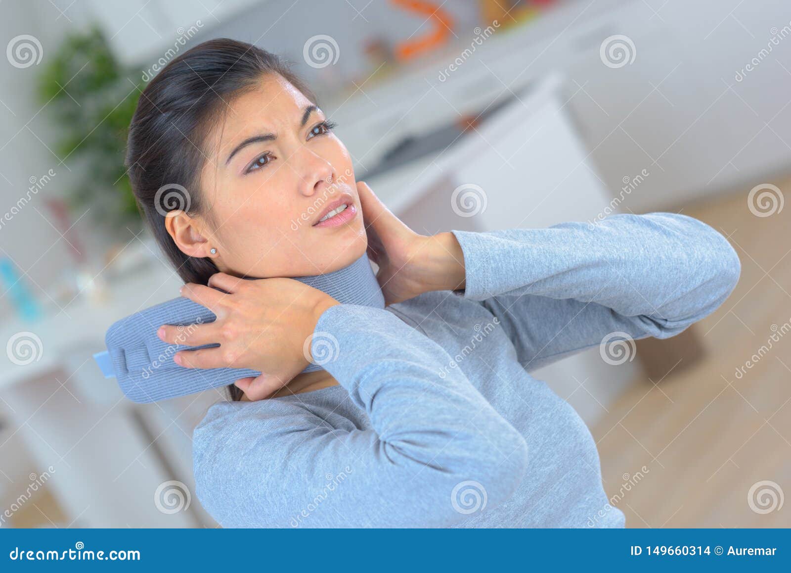 Adjusting the neck support stock photo. Image of help - 149660314