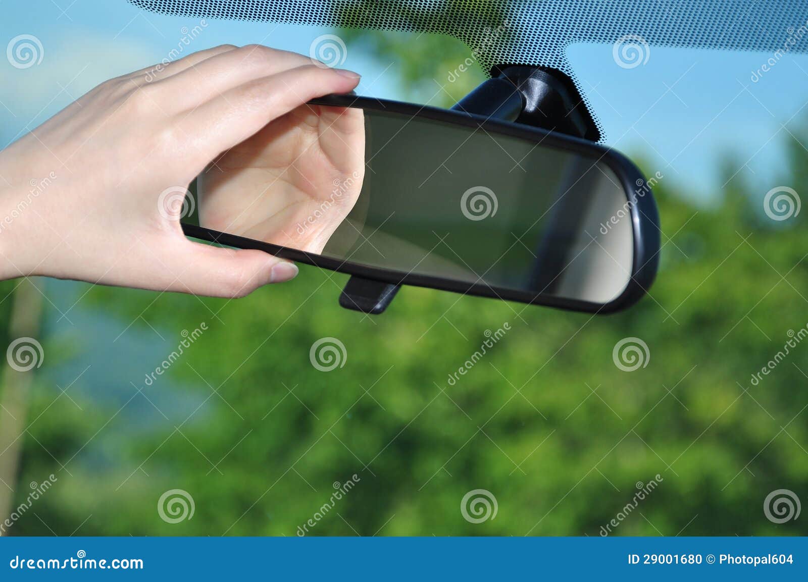 Adjusting rear view mirror stock photo. Image of closeup - 29001680