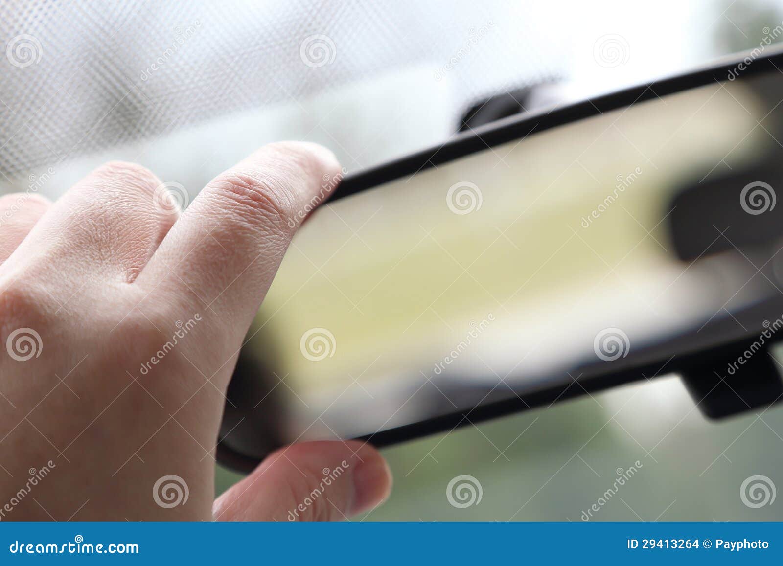 Adjusting Rear View Mirror; Focus On Hand, Silhouette Stock Image ...