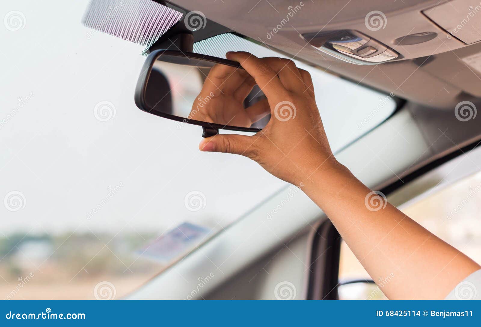 Adjusting Rear View Mirror. Stock Photo - Image of reflection, hispanic ...