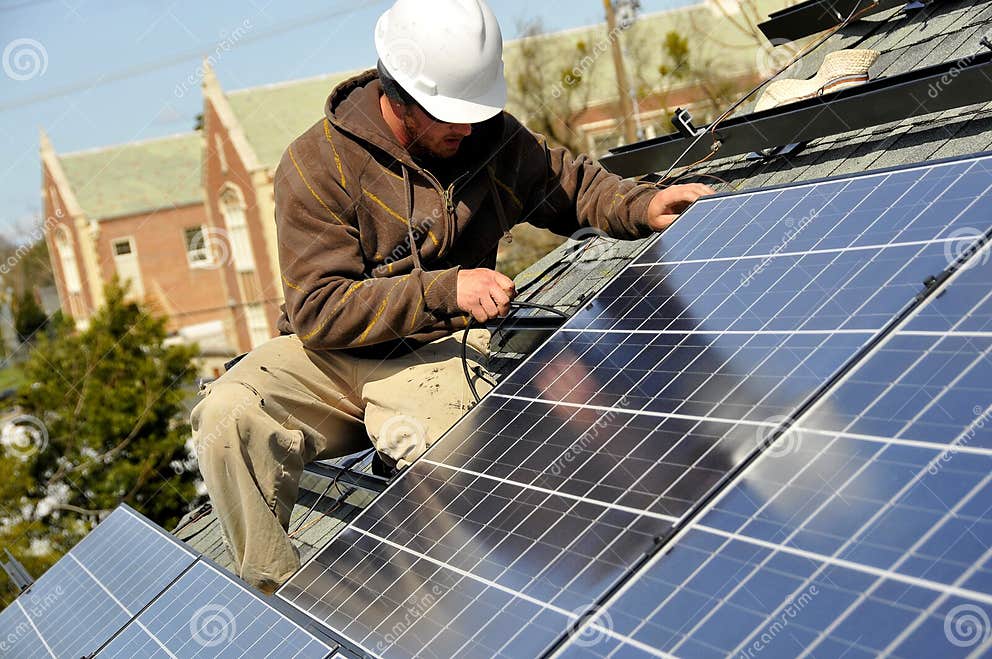 Adjusting Solar Panels 2 stock photo. Image of alternative - 18731010