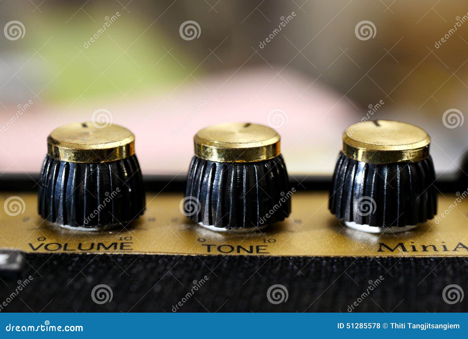 Adjusting a volume knob stock photo. Image of gold, chrome - 51285578