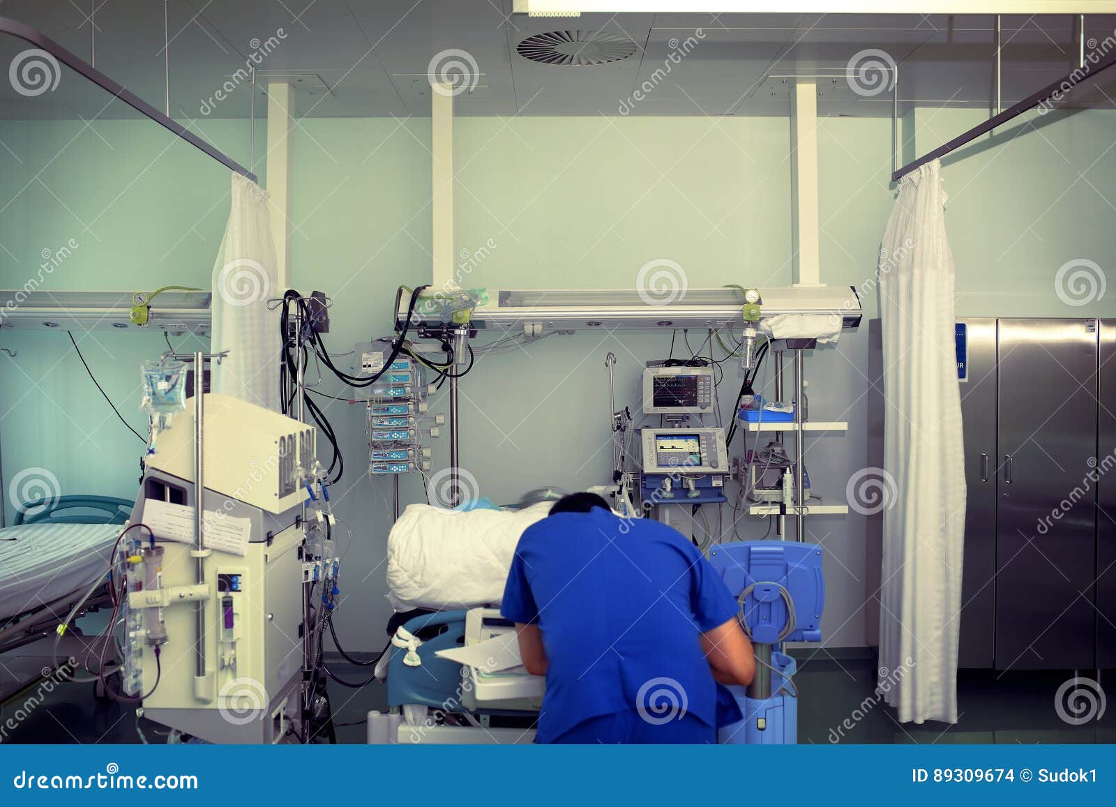 Adjustment of Equipment Performing by Technician in ICU Stock Photo ...