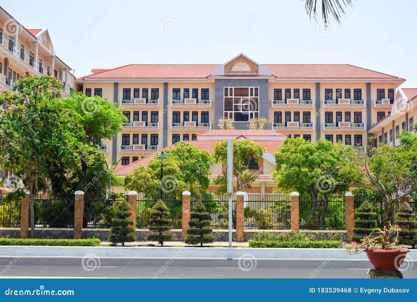 Administration Building with Beautiful Facade Behind a Fence and ...