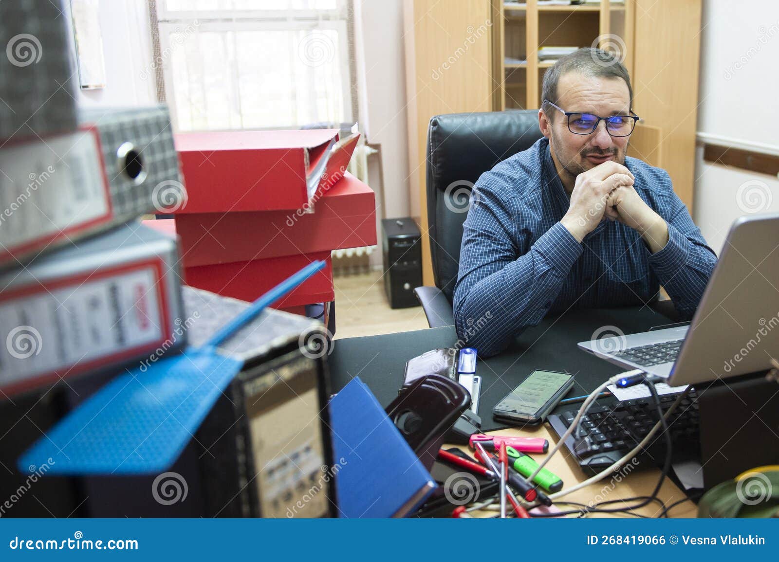 An Administrative Worker Working in a State-owned Company with a ...