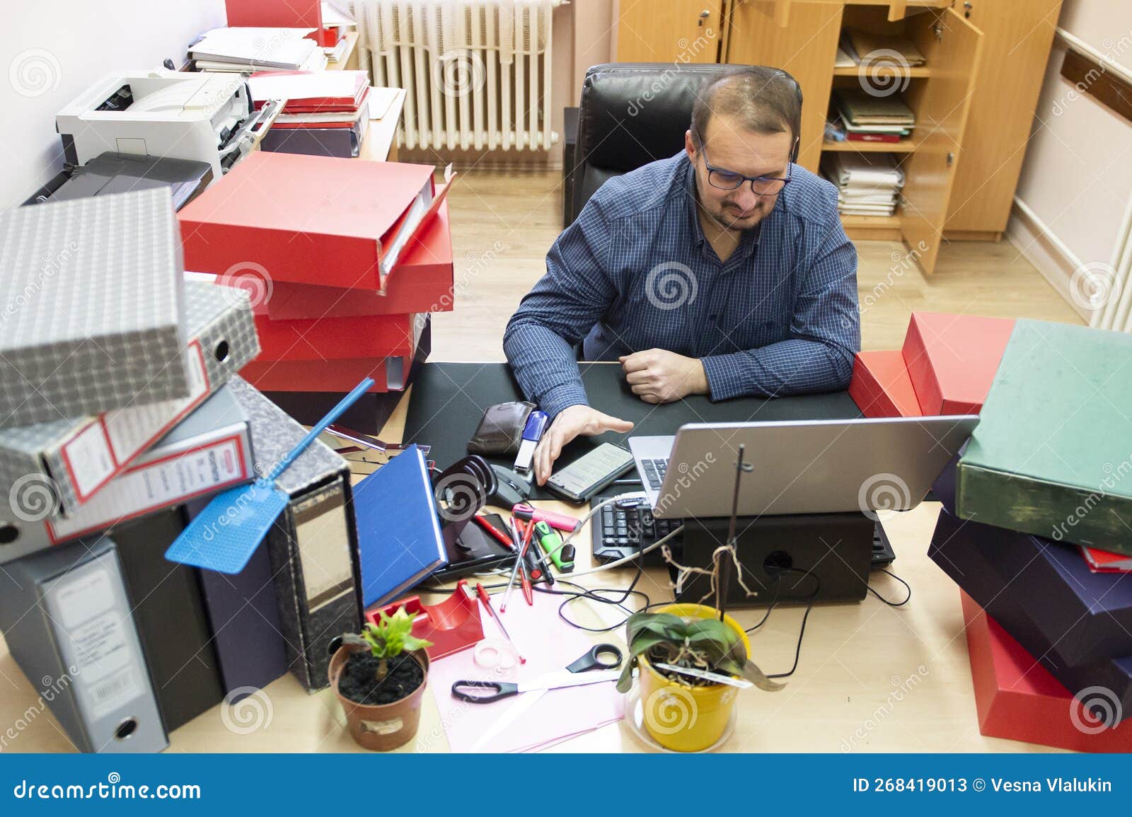 An Administrative Worker Working in a State-owned Company with a ...