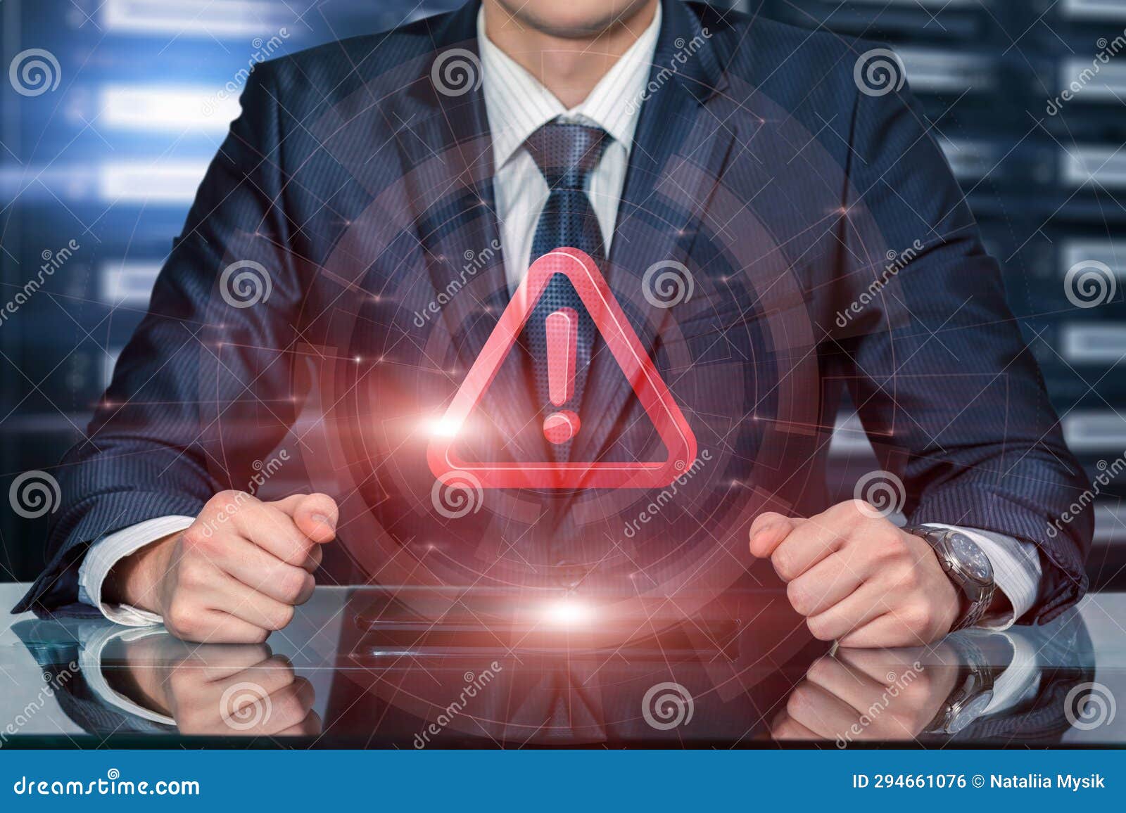 An Administrator Sits at a Table in Front of an Error Icon Stock Photo ...