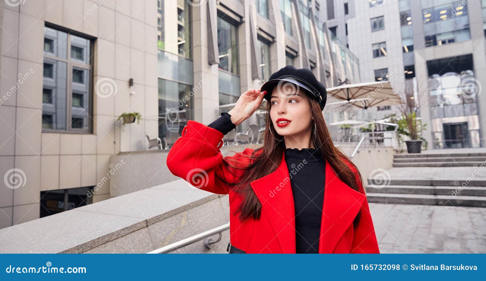 Admirable Ravishing Dreamy Girl Holds Her Black Kepi By Hand And Looks