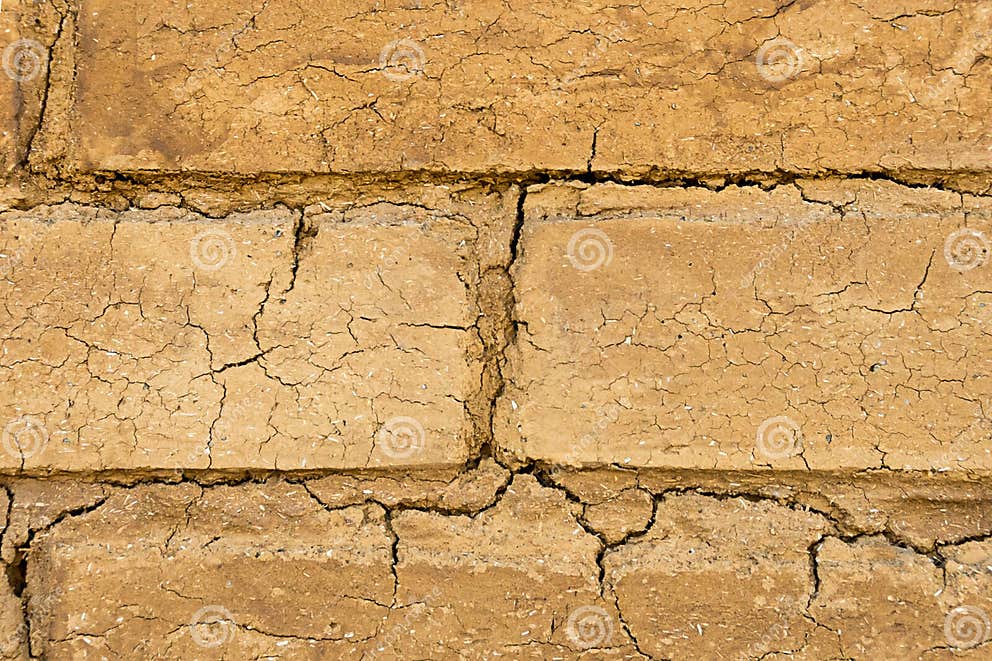 Adobe brick wall stock image. Image of construction - 161709777
