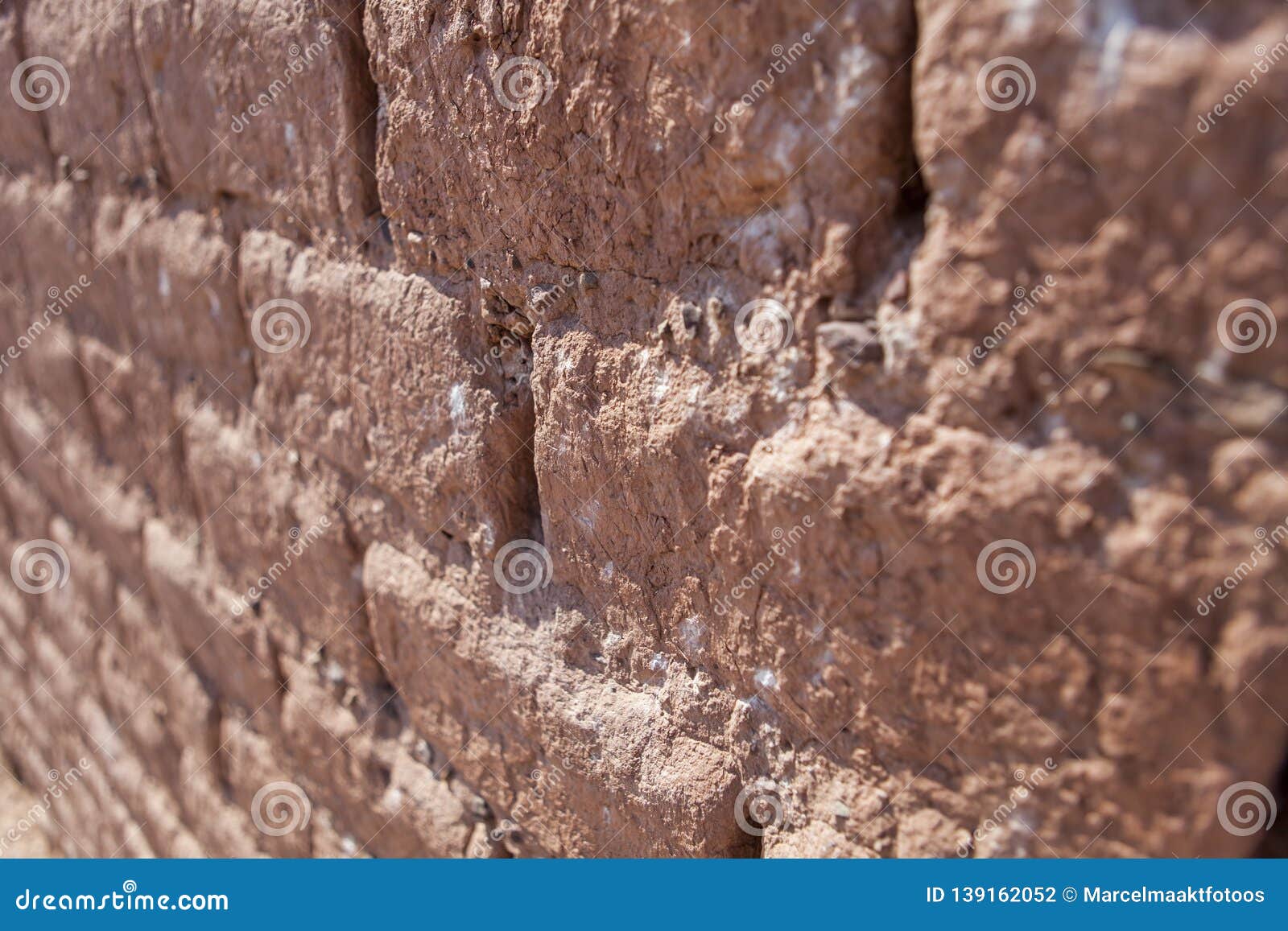 An Adobe Brick Wall in Sunny Floodlight Stock Photo - Image of texture ...