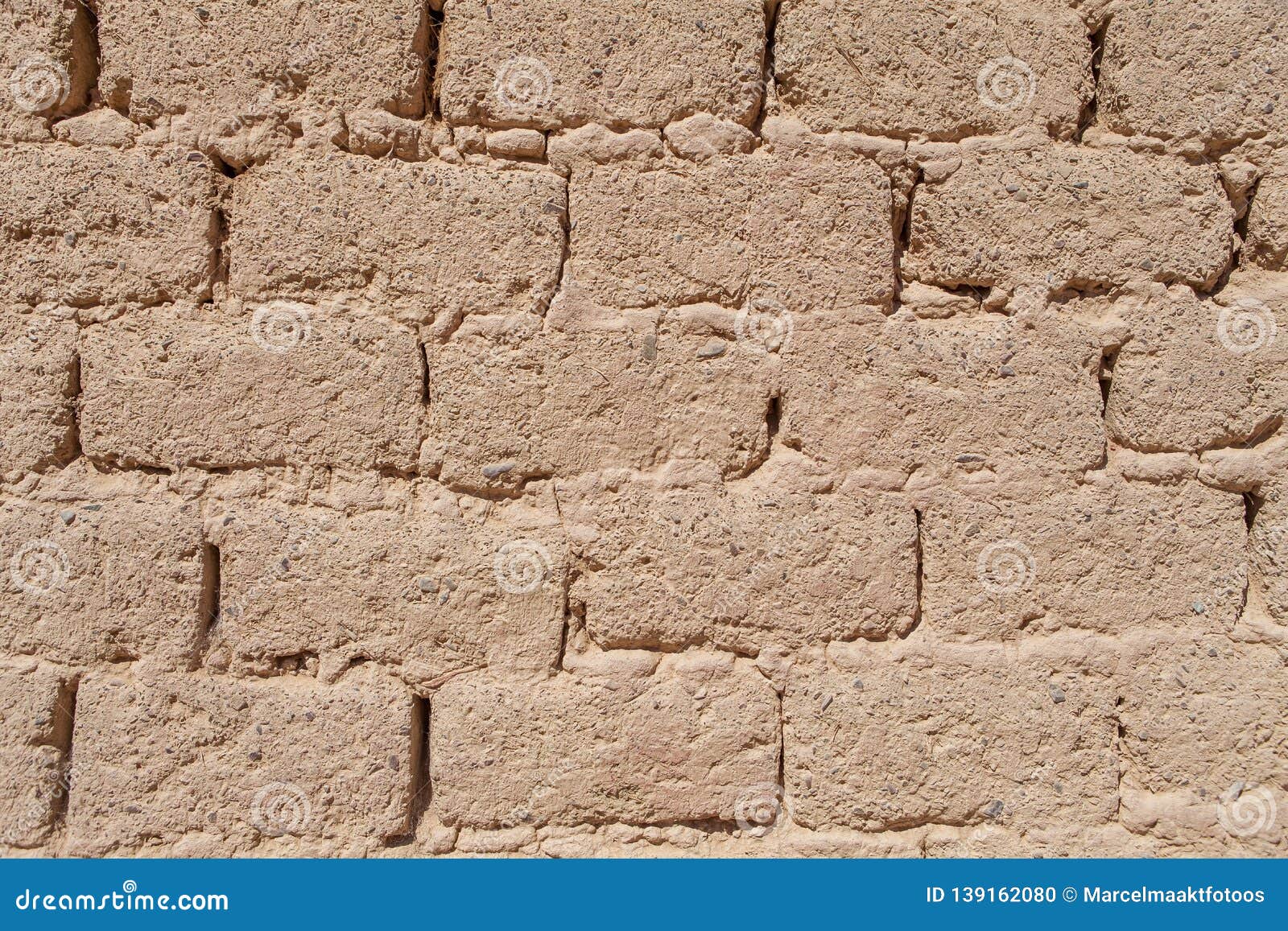 An Adobe Brick Wall in Full Sunlight Stock Photo - Image of background ...