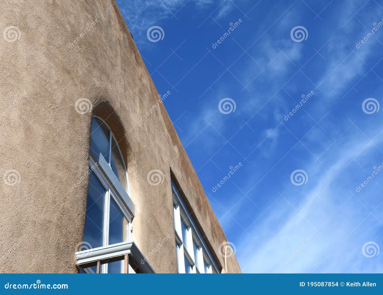 Modern Adobe Style Building With Orange Exterior Cement Stucco With ...