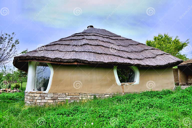 Adobe Clay House with Thatch Stock Photo - Image of meadow, green: 14436972
