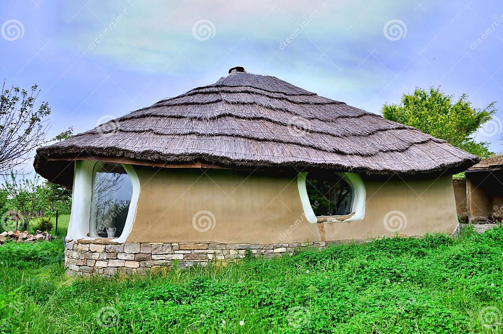 Adobe Clay House with Thatch Stock Photo - Image of meadow, green: 14436972