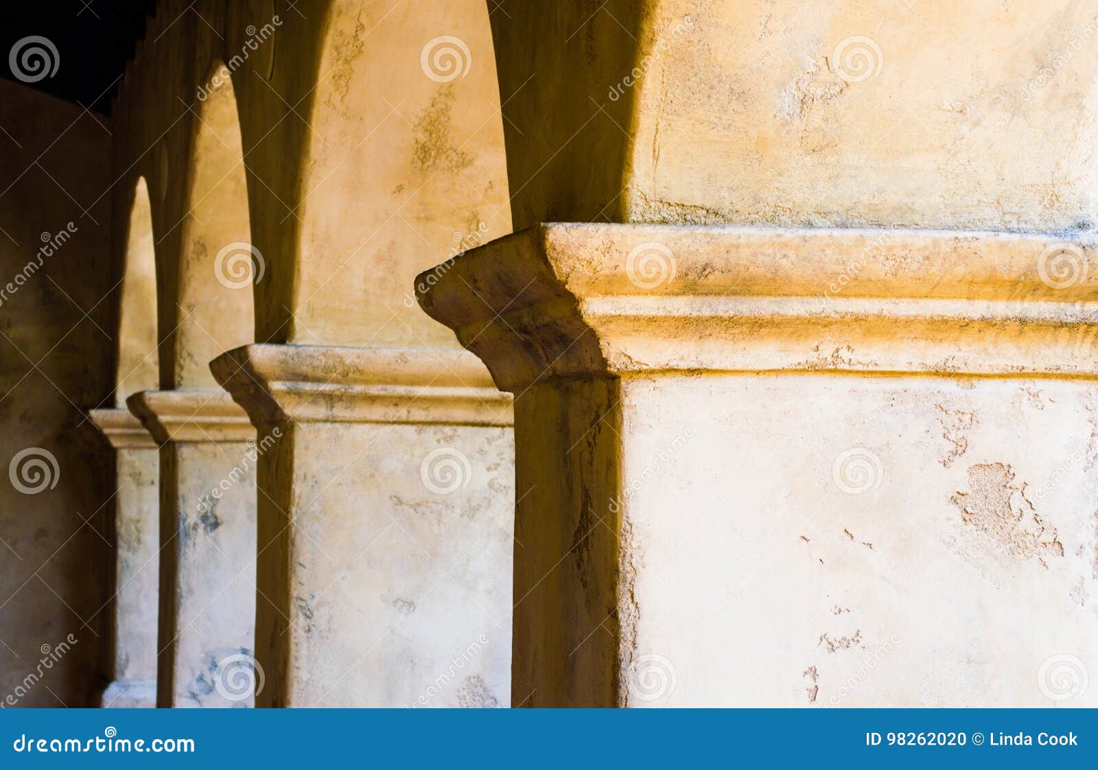 Adobe columns in a row stock photo. Image of building - 98262020