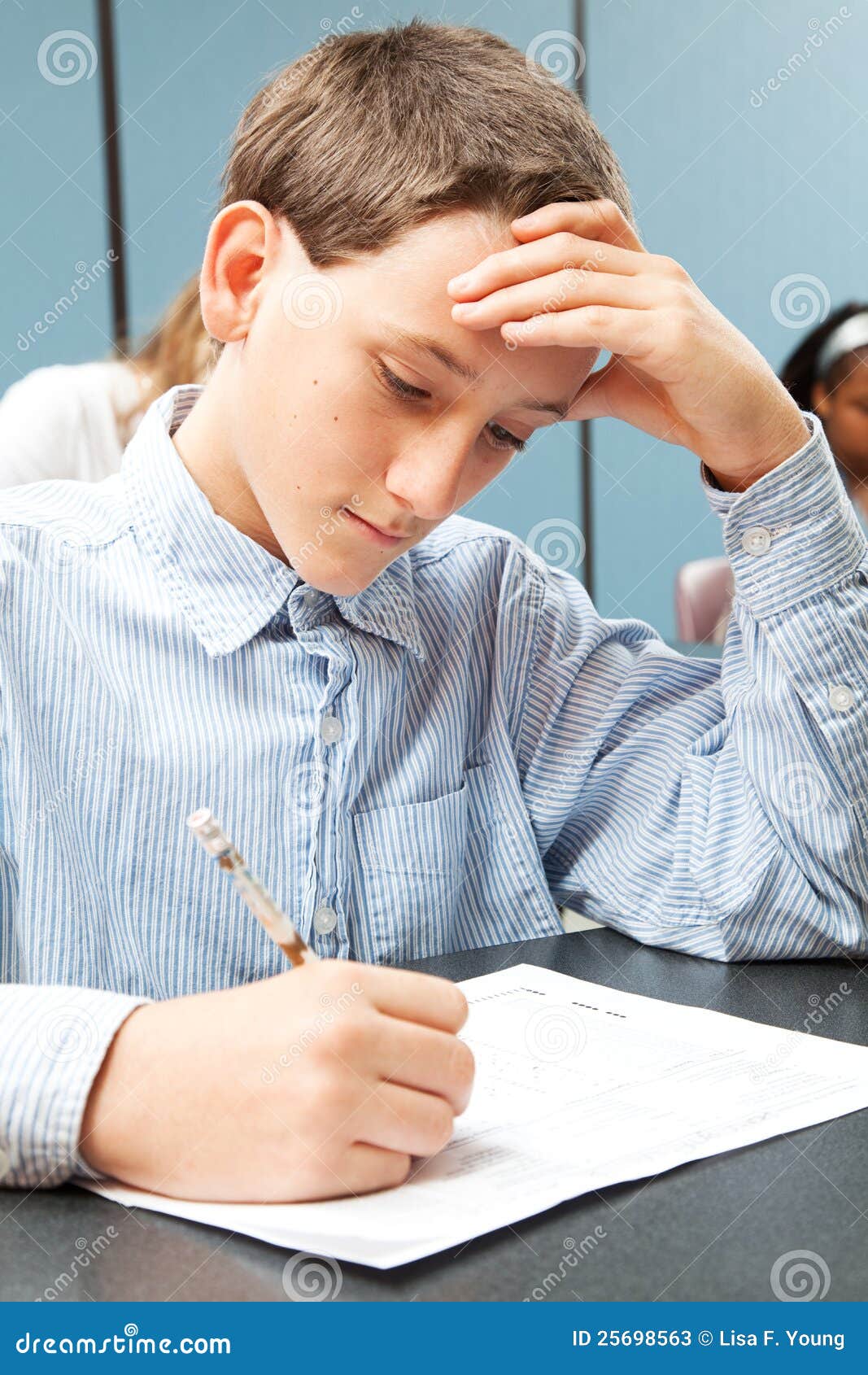 Adolescent Boy in Class stock image. Image of struggle - 25698563