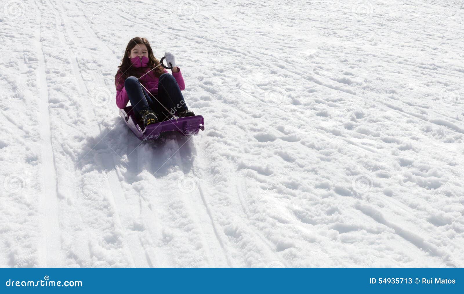 Adolescent girl sledding stock image. Image of sledding - 54935713