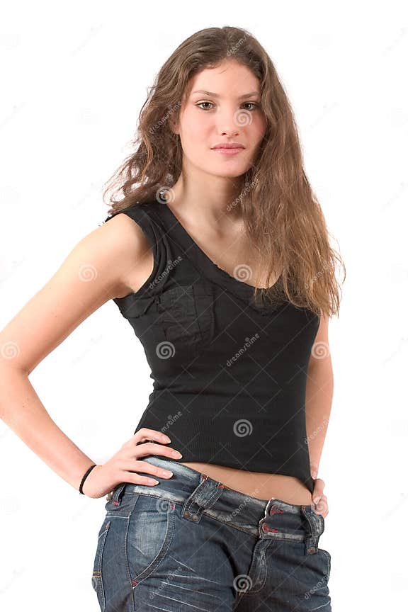 Adolescente Hermoso Que Se Coloca Con Las Manos En Sus Caderas Imagen