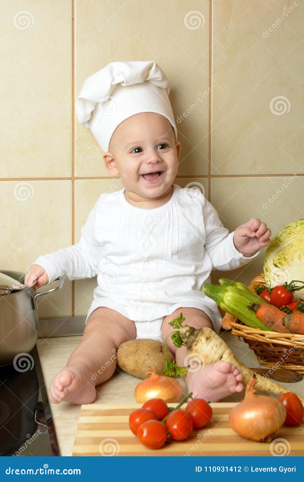 Baby shef in the kitchen stock photo. Image of happy - 110931412