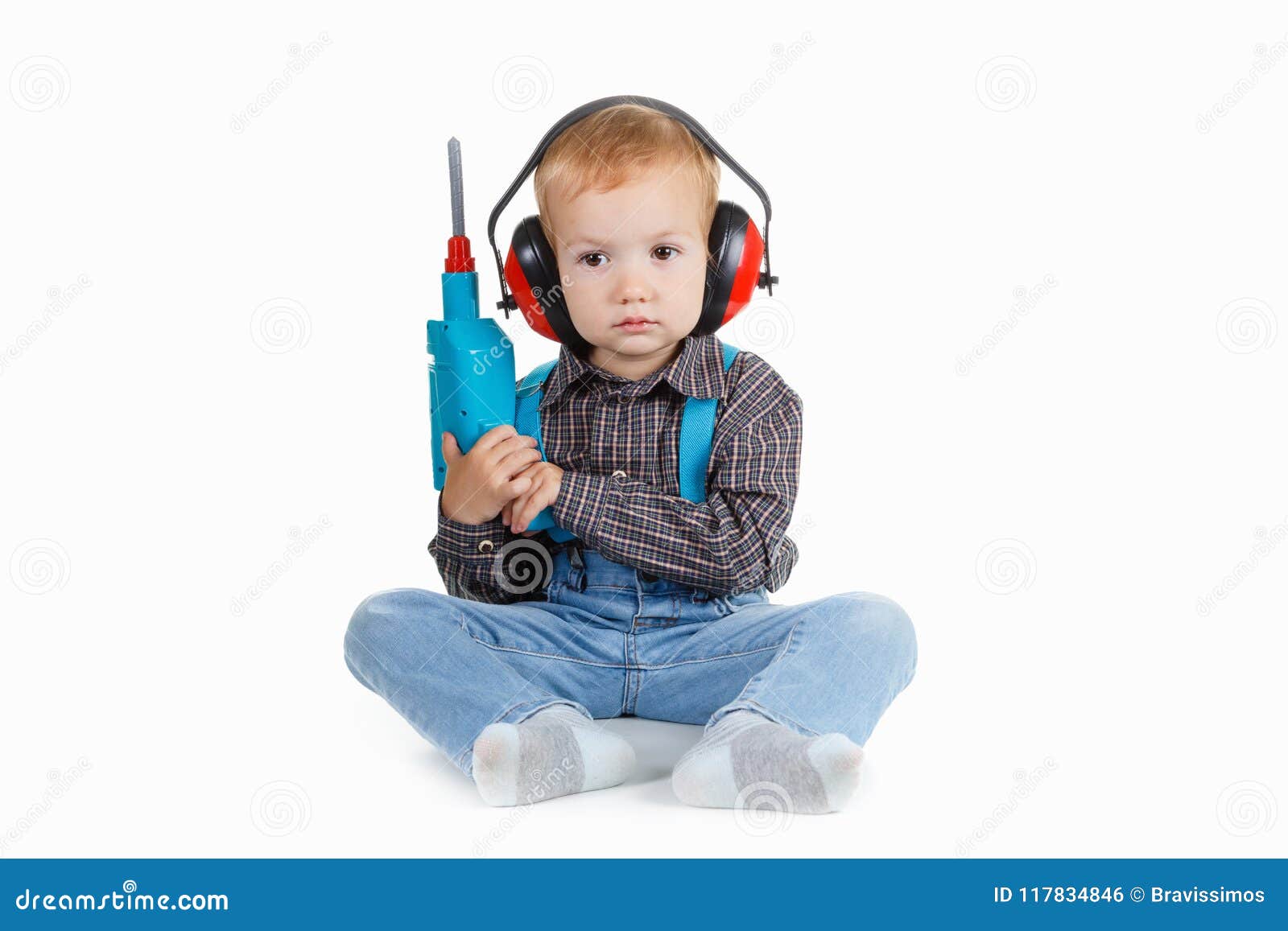 Adorable Baby Dressed As Workman Playing with Plastic Tools. Isolated ...