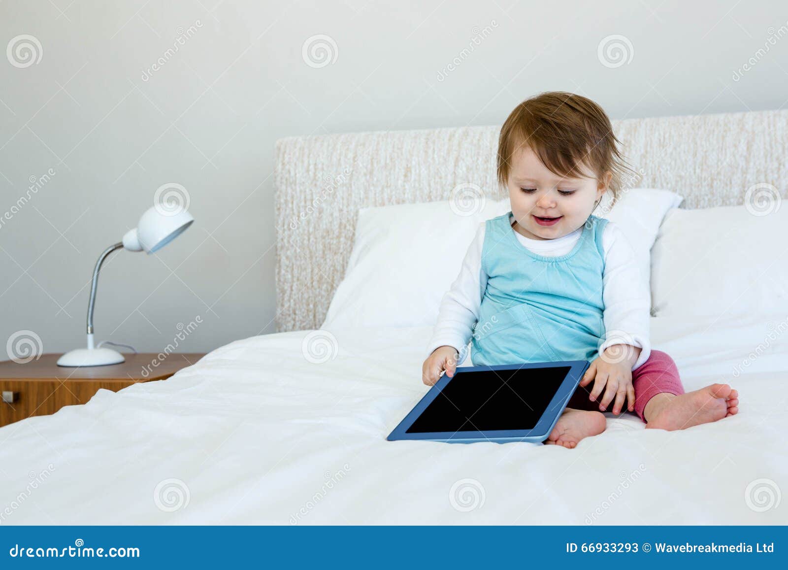 Adorable Baby Holding a Tablet Computer Stock Image - Image of ...