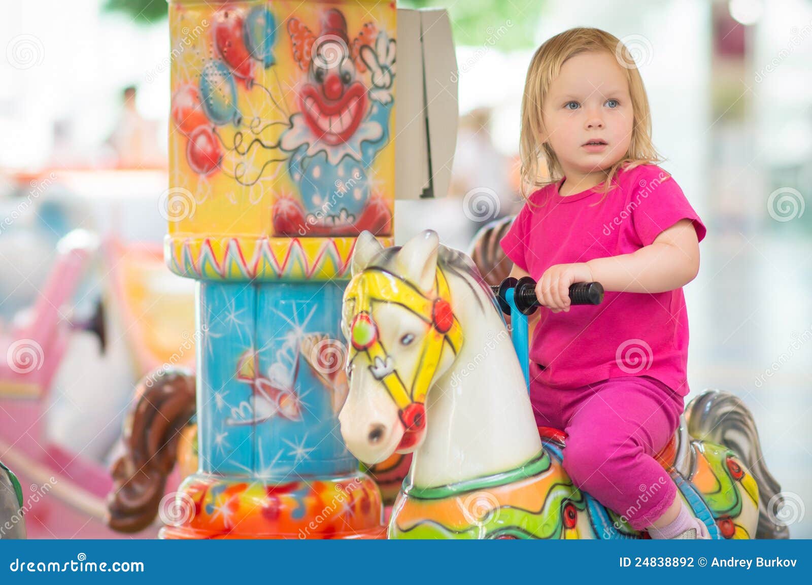 Adorable Baby Ride on Carousel in Mall Stock Photo - Image of mall ...