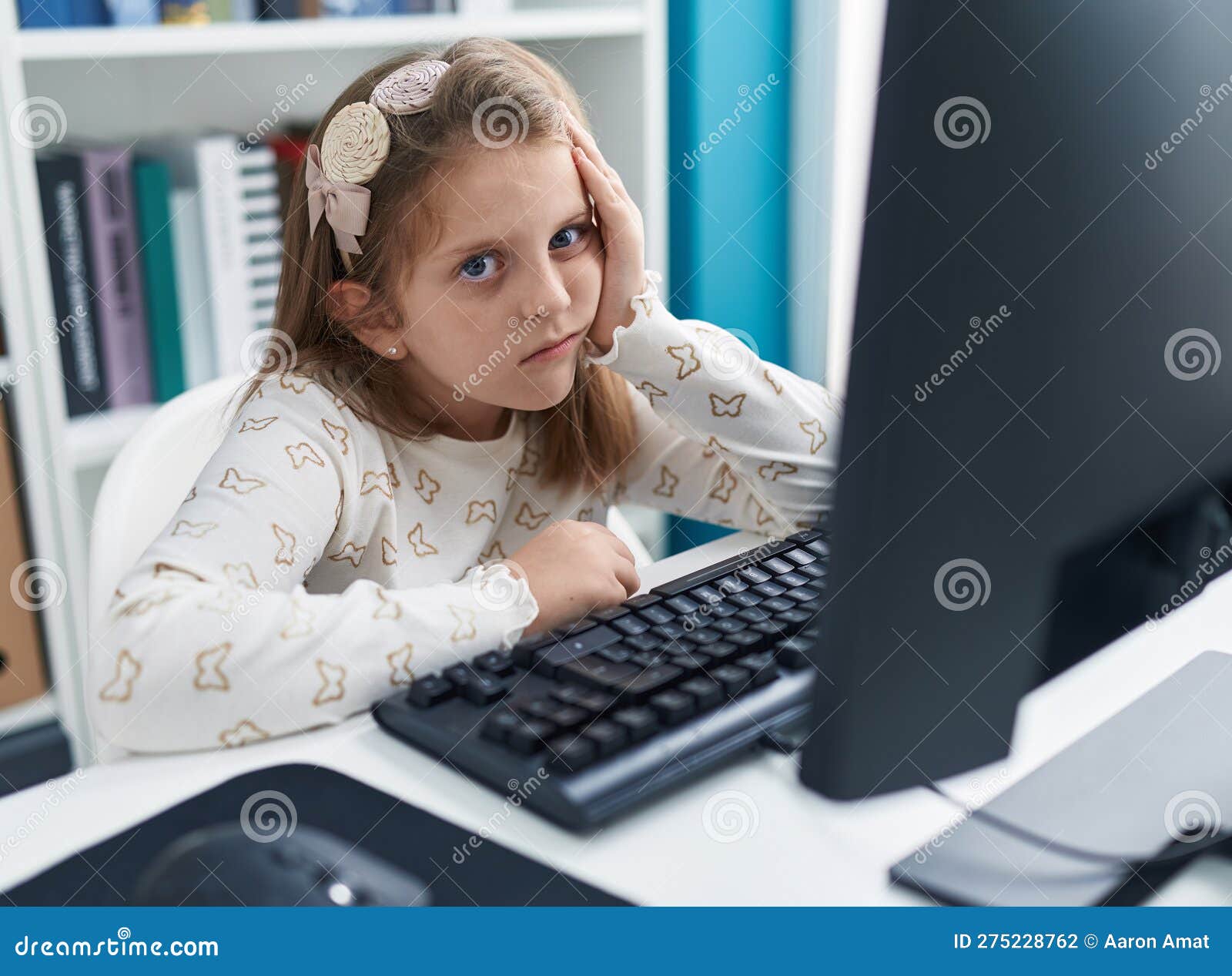 Adorable Blonde Girl Student Tired Using Computer at Classroom Stock ...