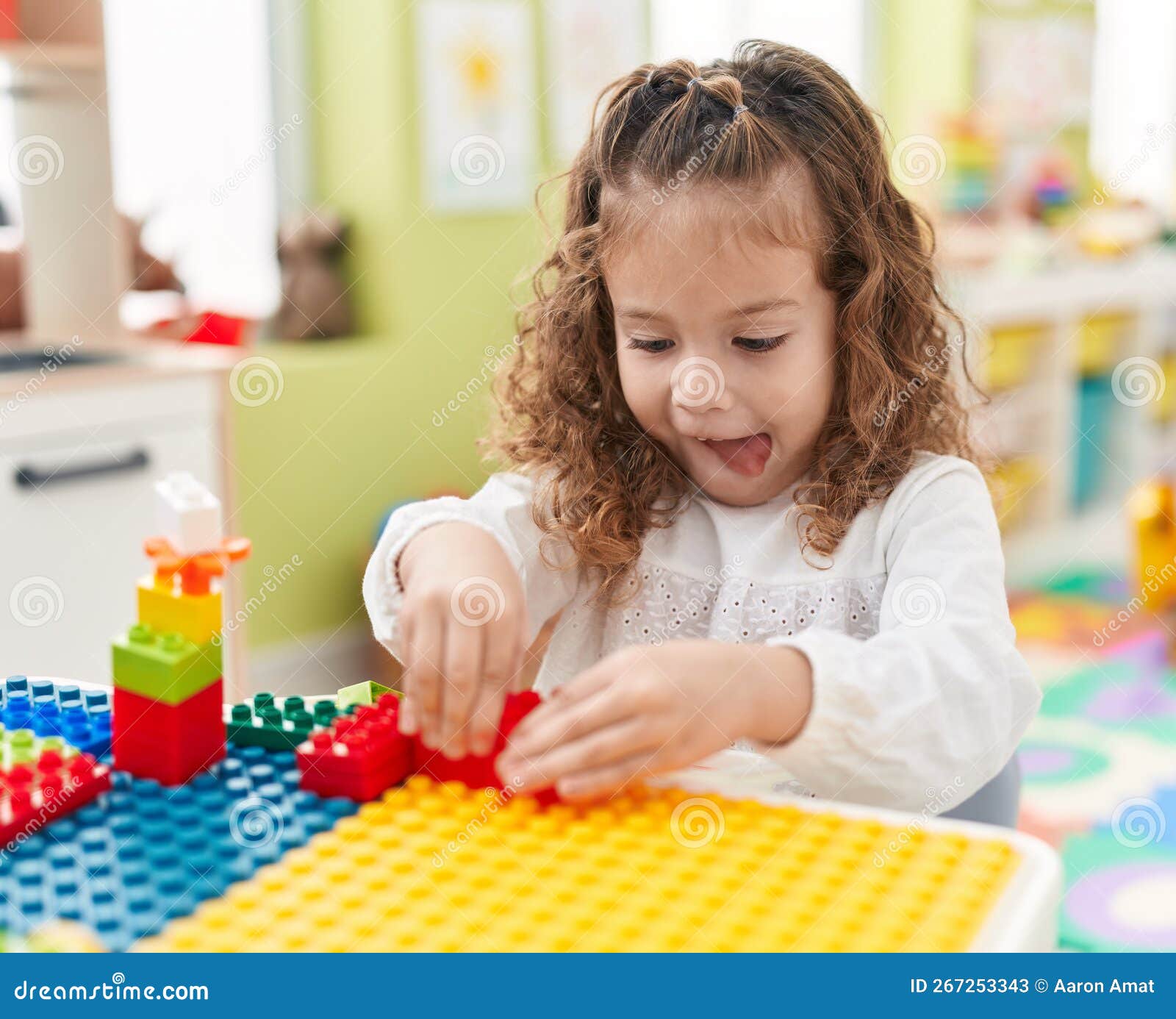 Adorable Blonde Toddler Playing with Construction Blocks Sitting on ...