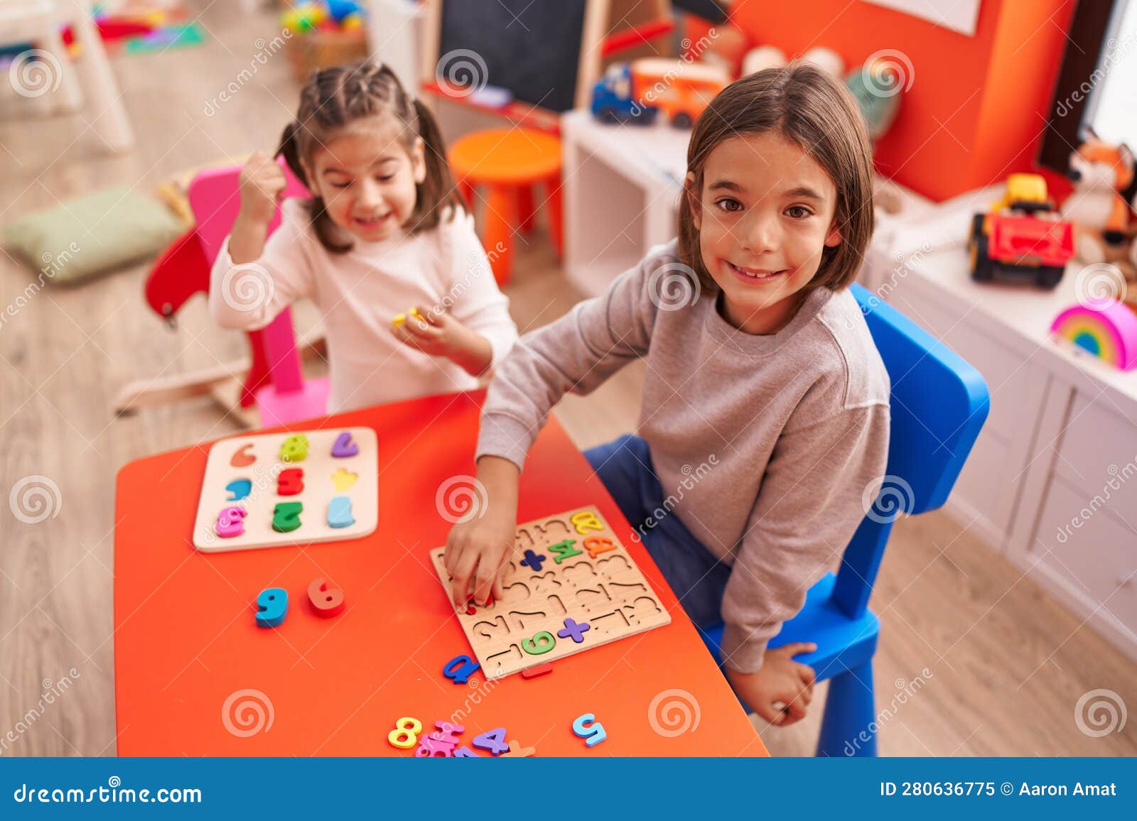 Adorable Boy and Girl Playing with Maths Puzzle Game Sitting on Table ...