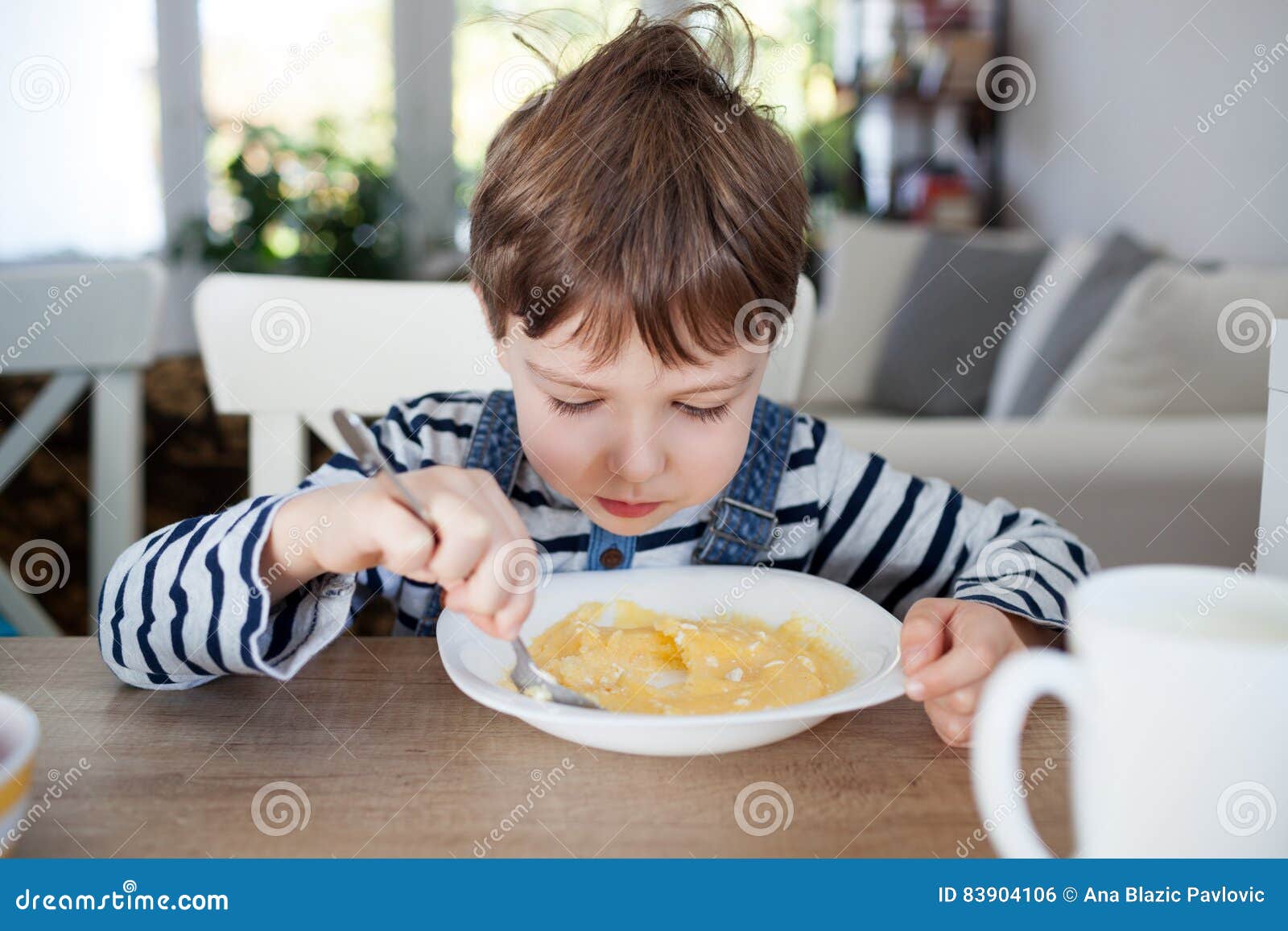 Adorable Boy Having a Breakfast Stock Photo - Image of milk, family ...