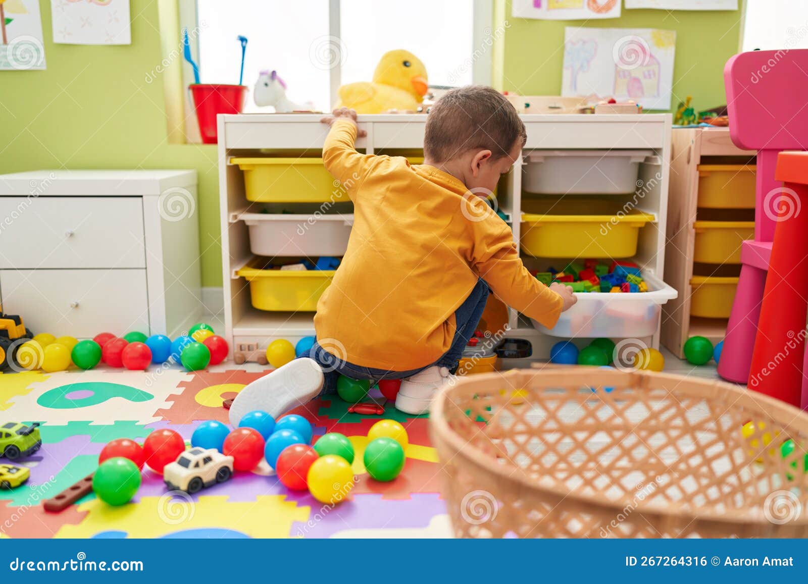 Adorable Caucasian Boy Holing Cube with Construction Blocks at ...