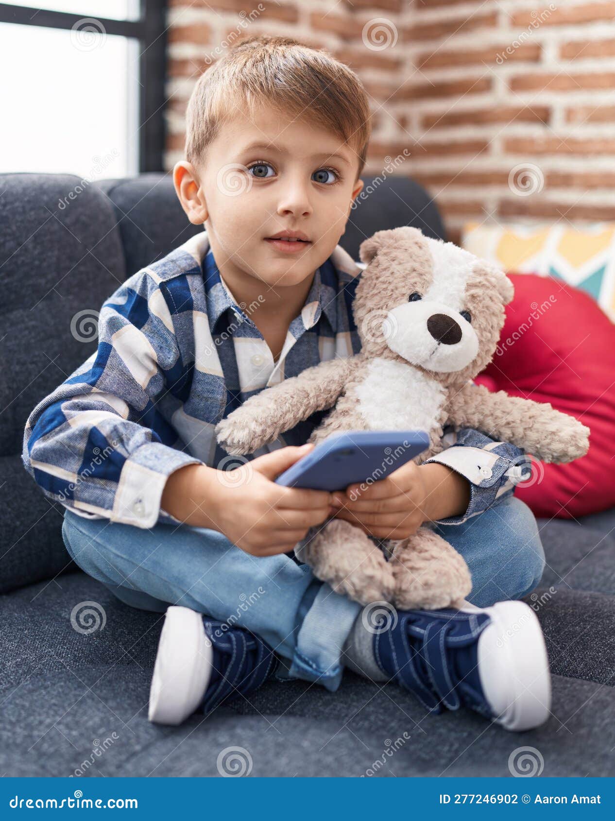 Adorable Caucasian Boy Hugging Teddy Bear Using Smartphone at Home ...