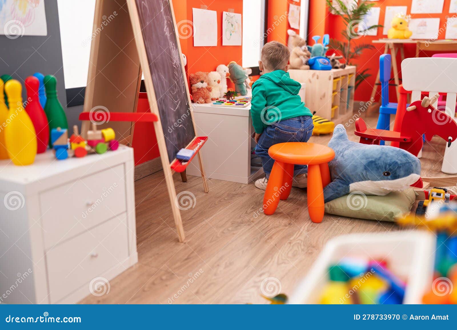 Adorable Caucasian Boy Playing on Back View at Kindergarten Stock Photo ...