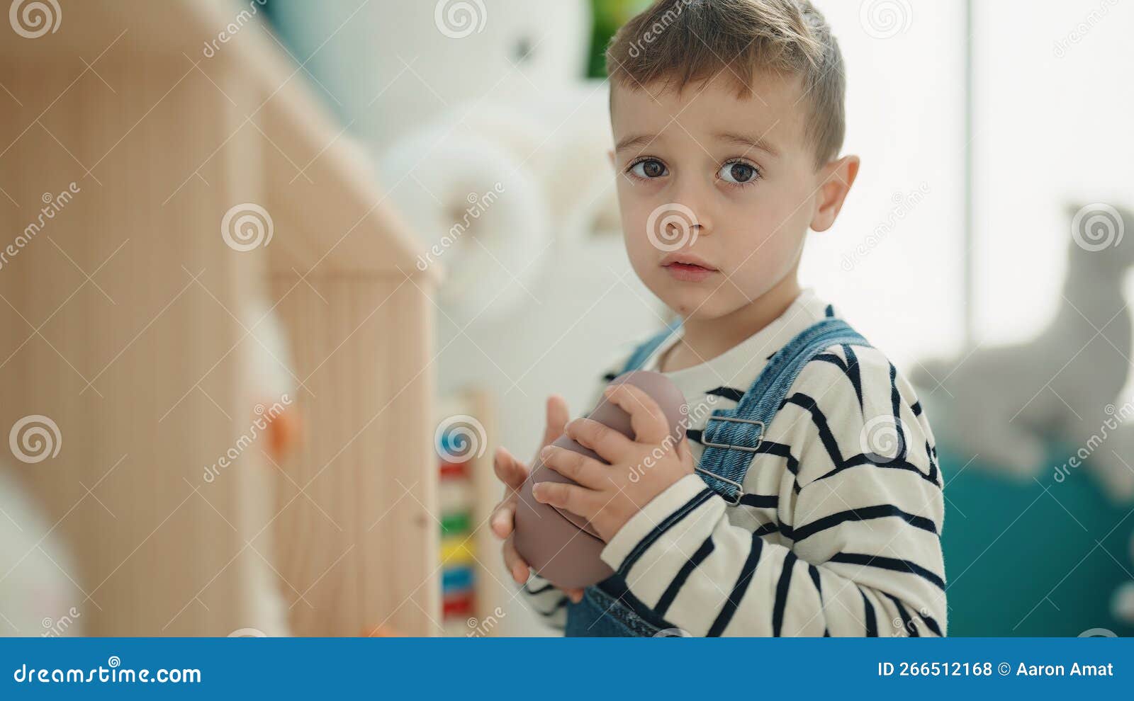 Adorable Caucasian Boy Standing with Relaxed Expression at Kindergarten ...