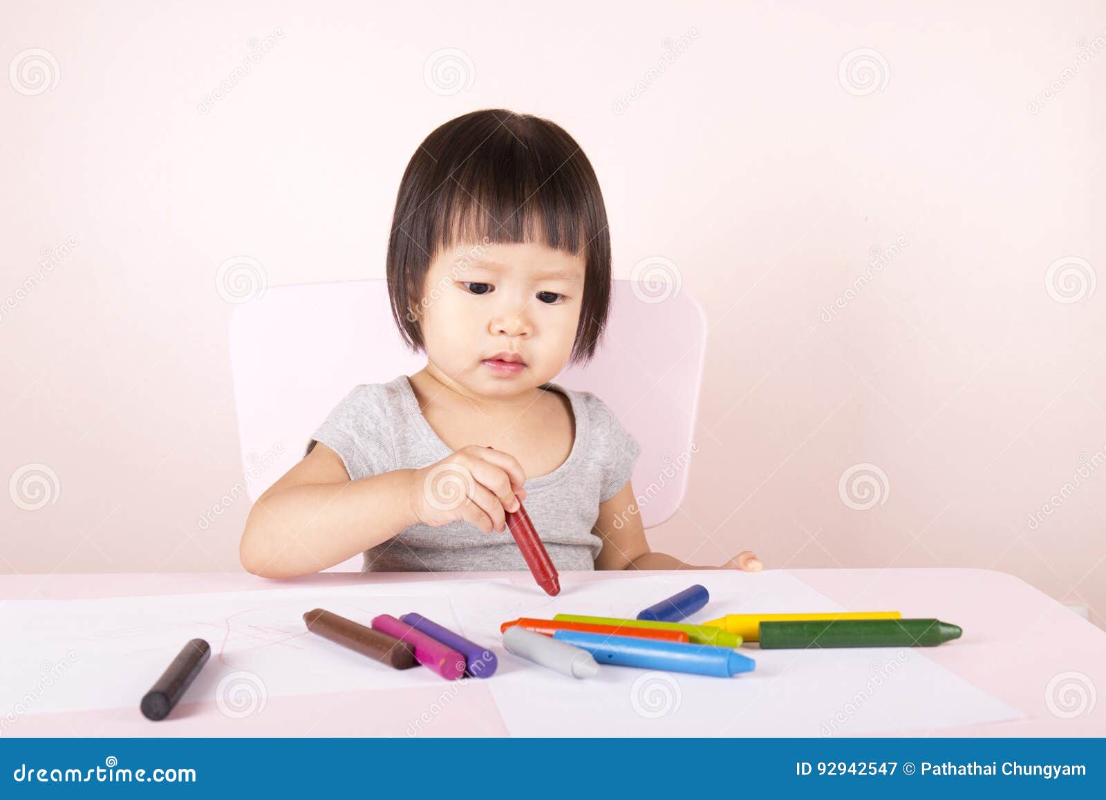 Adorable Child Drawing with Colorful Crayons. Stock Image - Image of ...