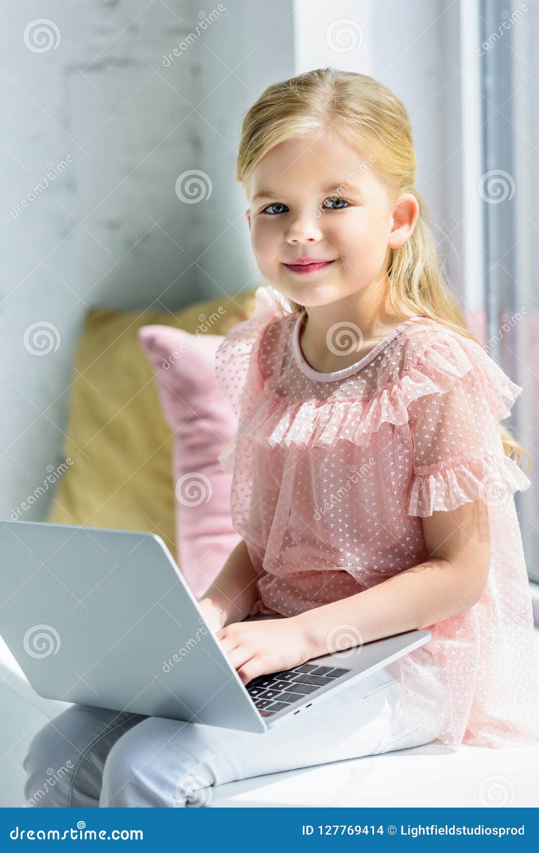Adorable Child Using Laptop and Smiling at Camera Stock Photo - Image ...