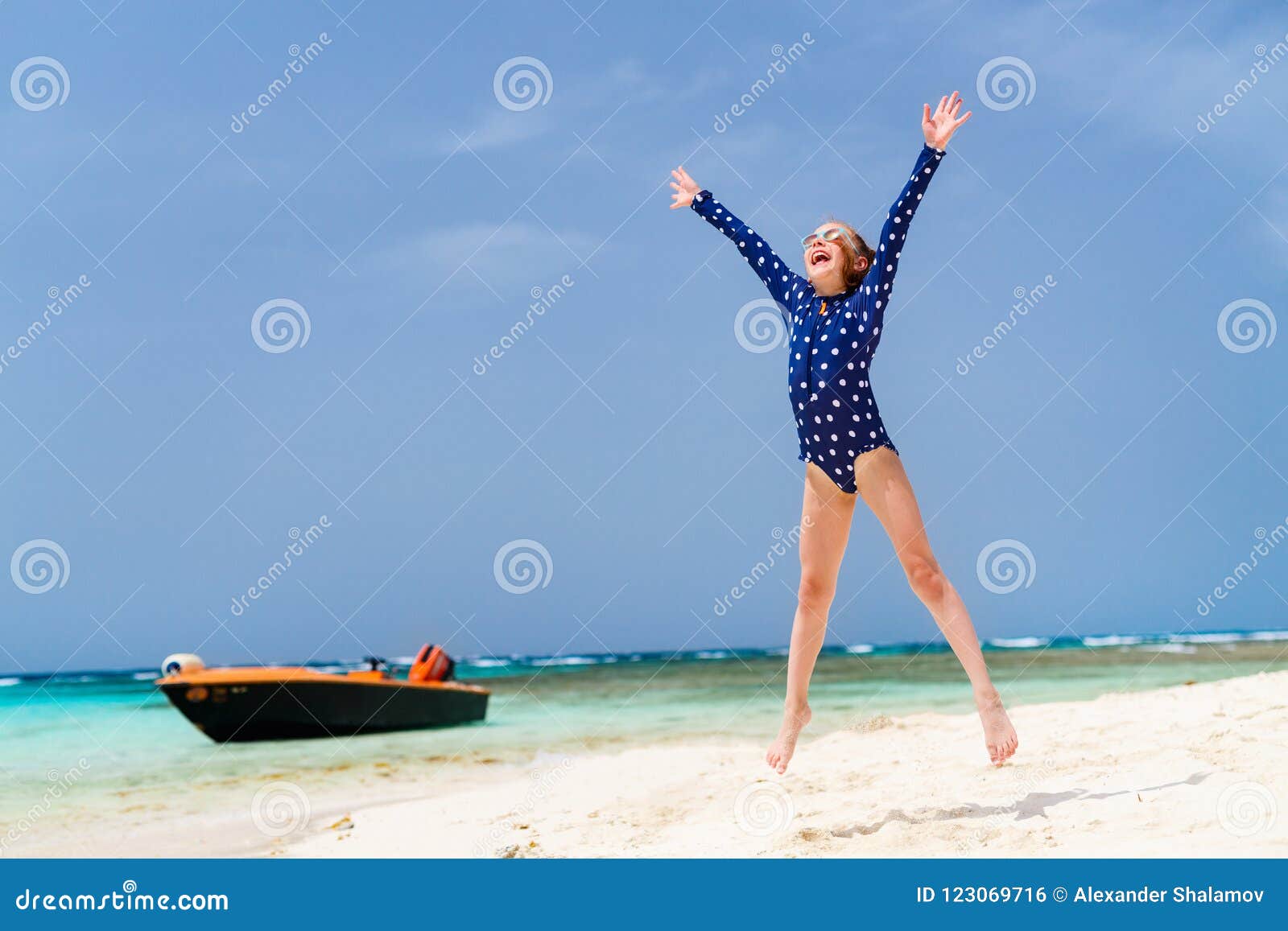 Adorable girl at beach stock photo. Image of beach, tropical - 123069716