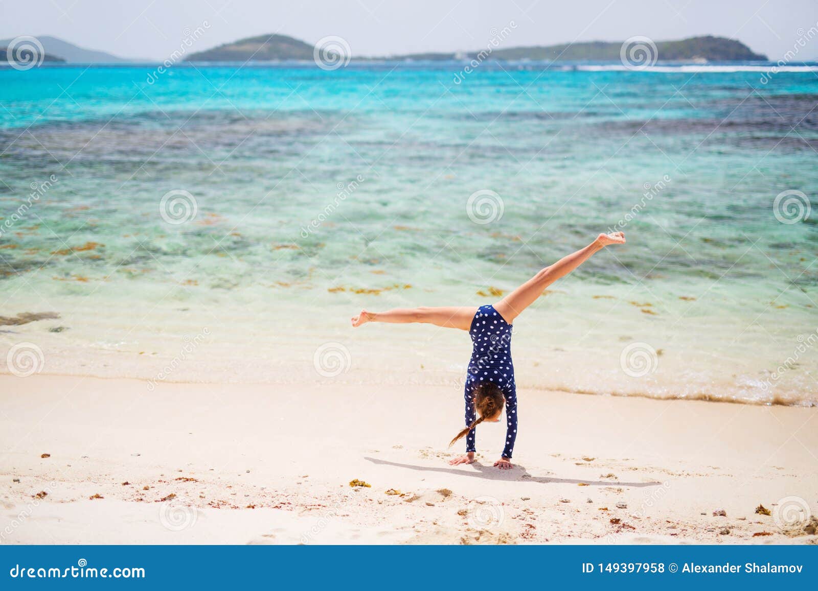 Adorable girl at beach stock photo. Image of adorable - 149397958