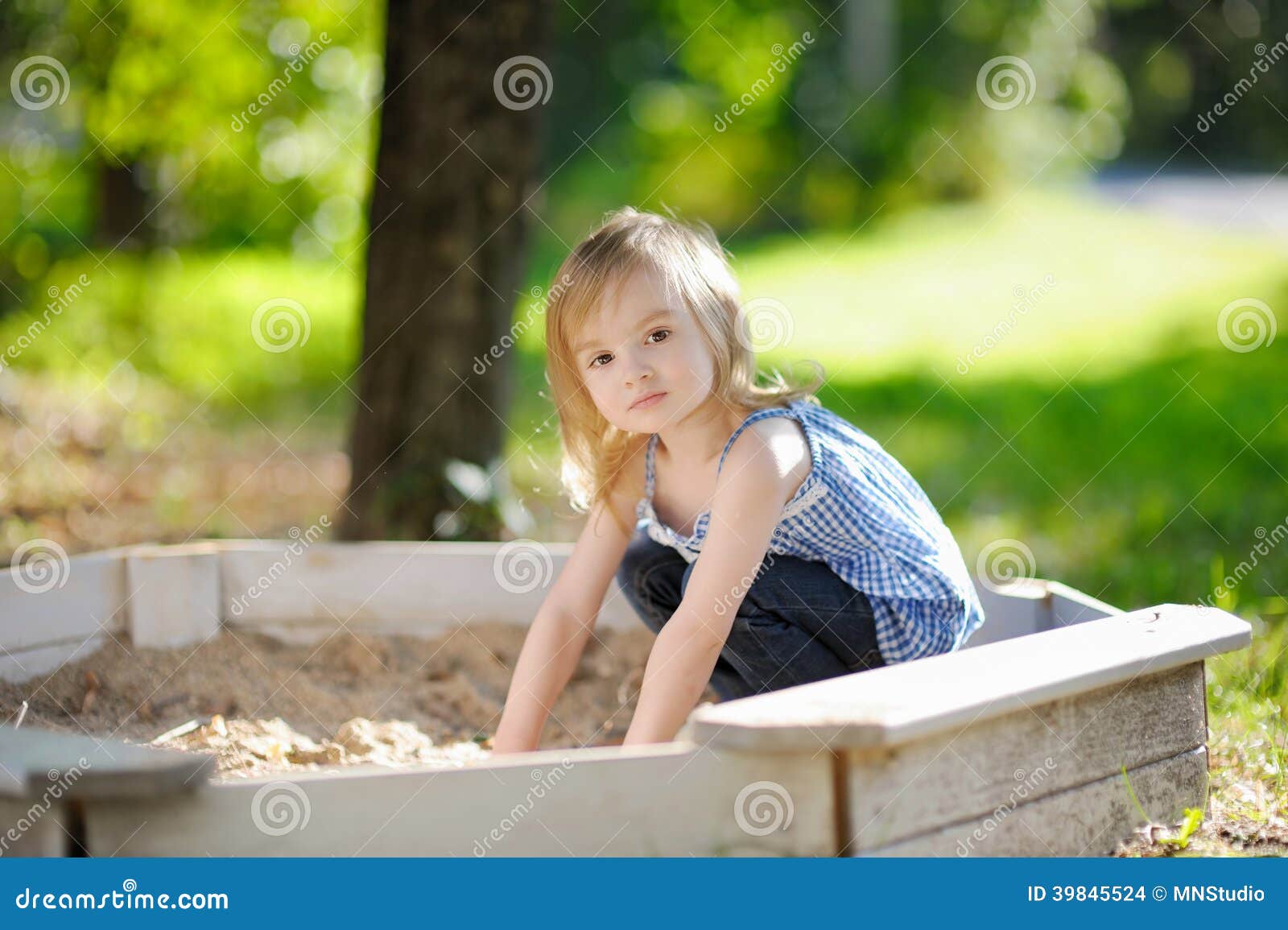 Adorable Girl Playing in a Sandbox Stock Photo - Image of happy ...