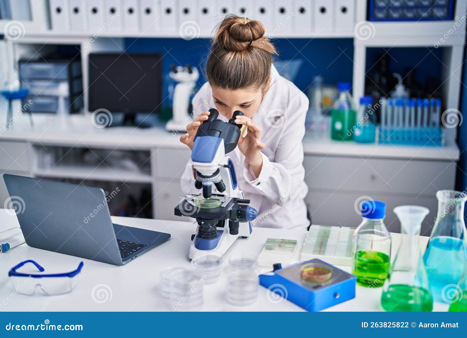 Adorable Girl Scientist Using Microscope Working at Laboratory Stock ...