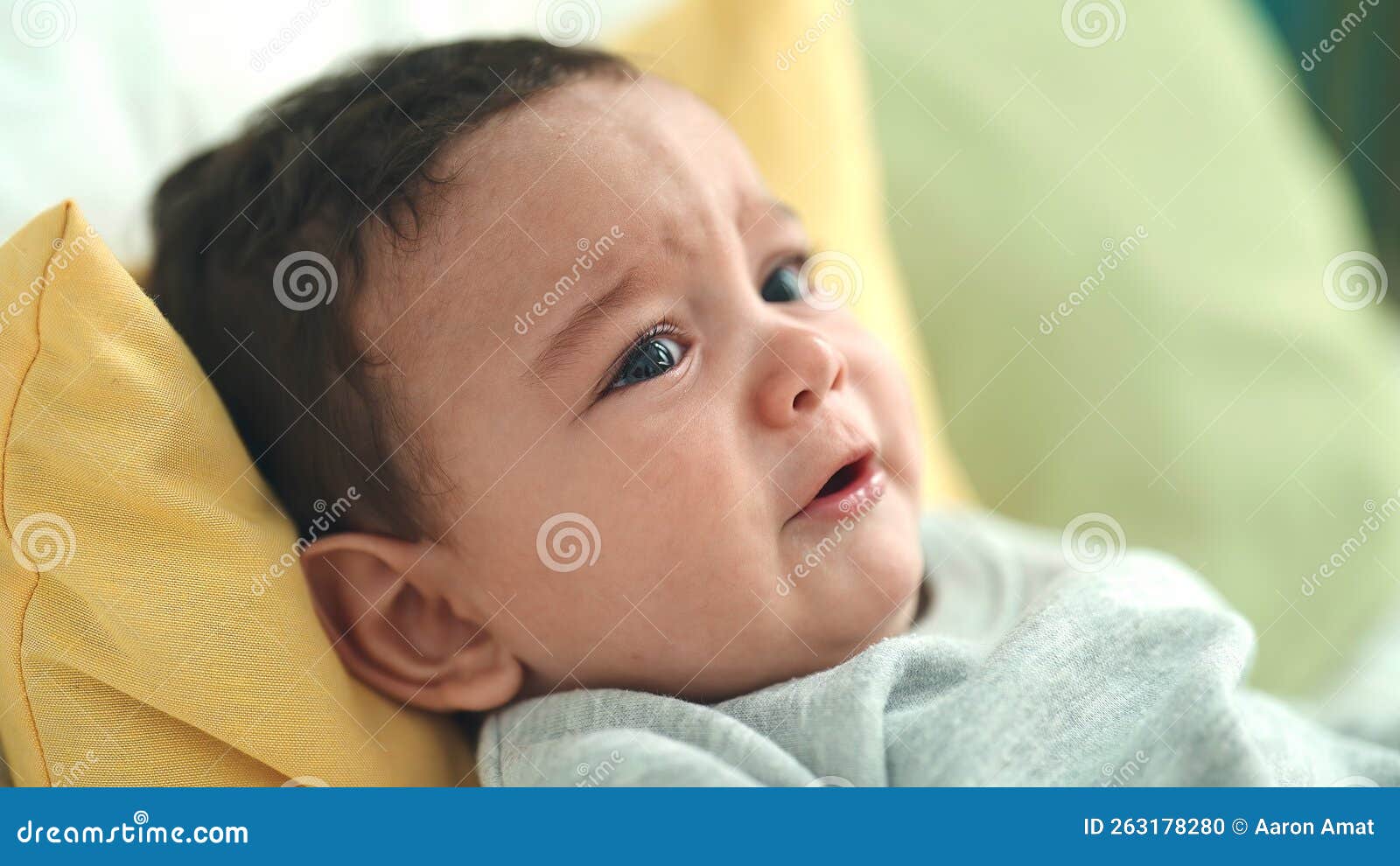 Adorable Hispanic Baby Lying on Bed Crying at Bedroom Stock Photo ...