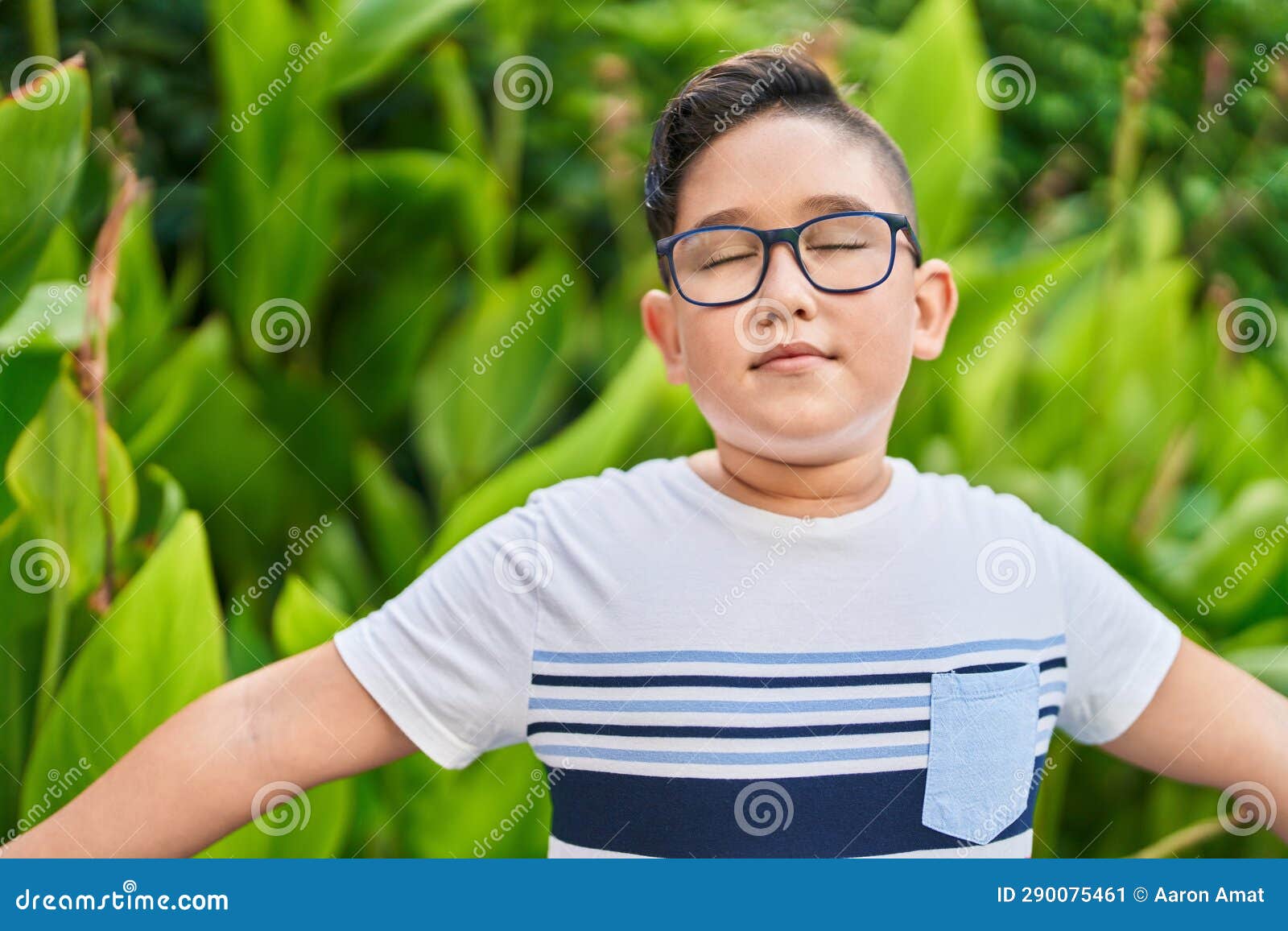 Adorable Hispanic Boy Breathing with Closed Eyes at Park Stock Image - Image of meditation ...