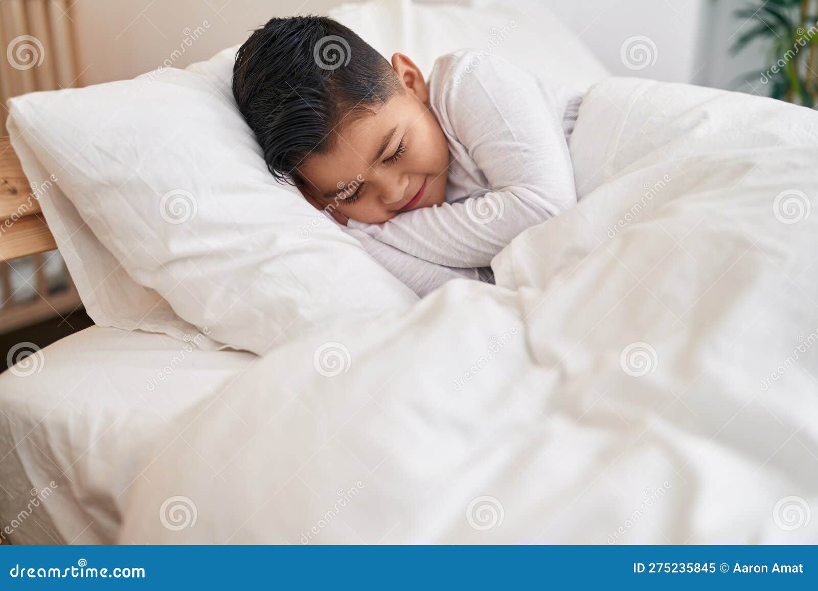 Adorable Hispanic Boy Lying on Bed Sleeping at Bedroom Stock Image ...