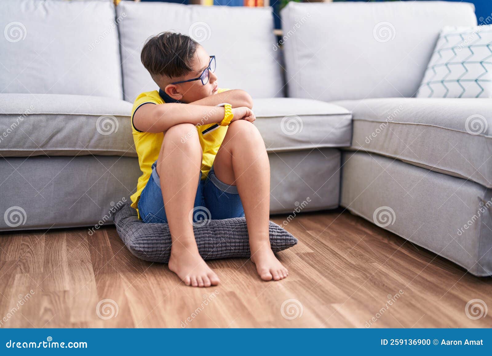 Adorable Hispanic Boy Stressed Sitting on Floor at Home Stock Photo ...
