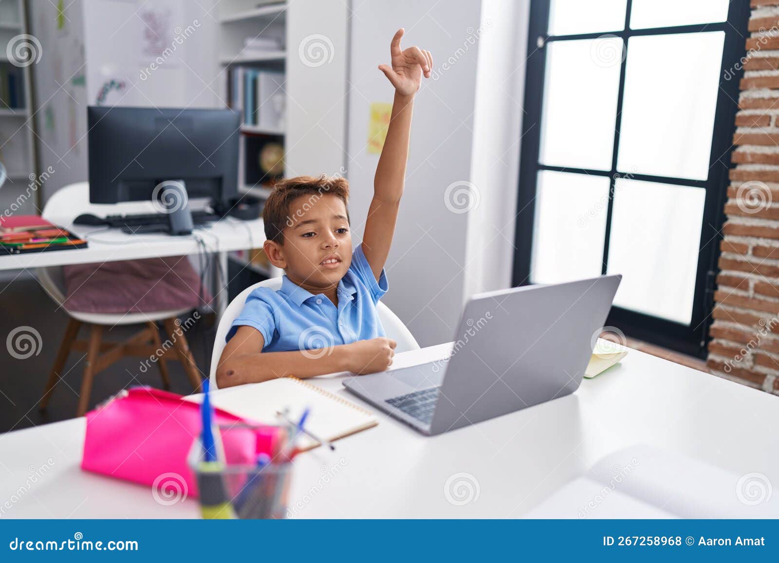 Adorable Hispanic Boy Student Using Computer Having Long Distance ...