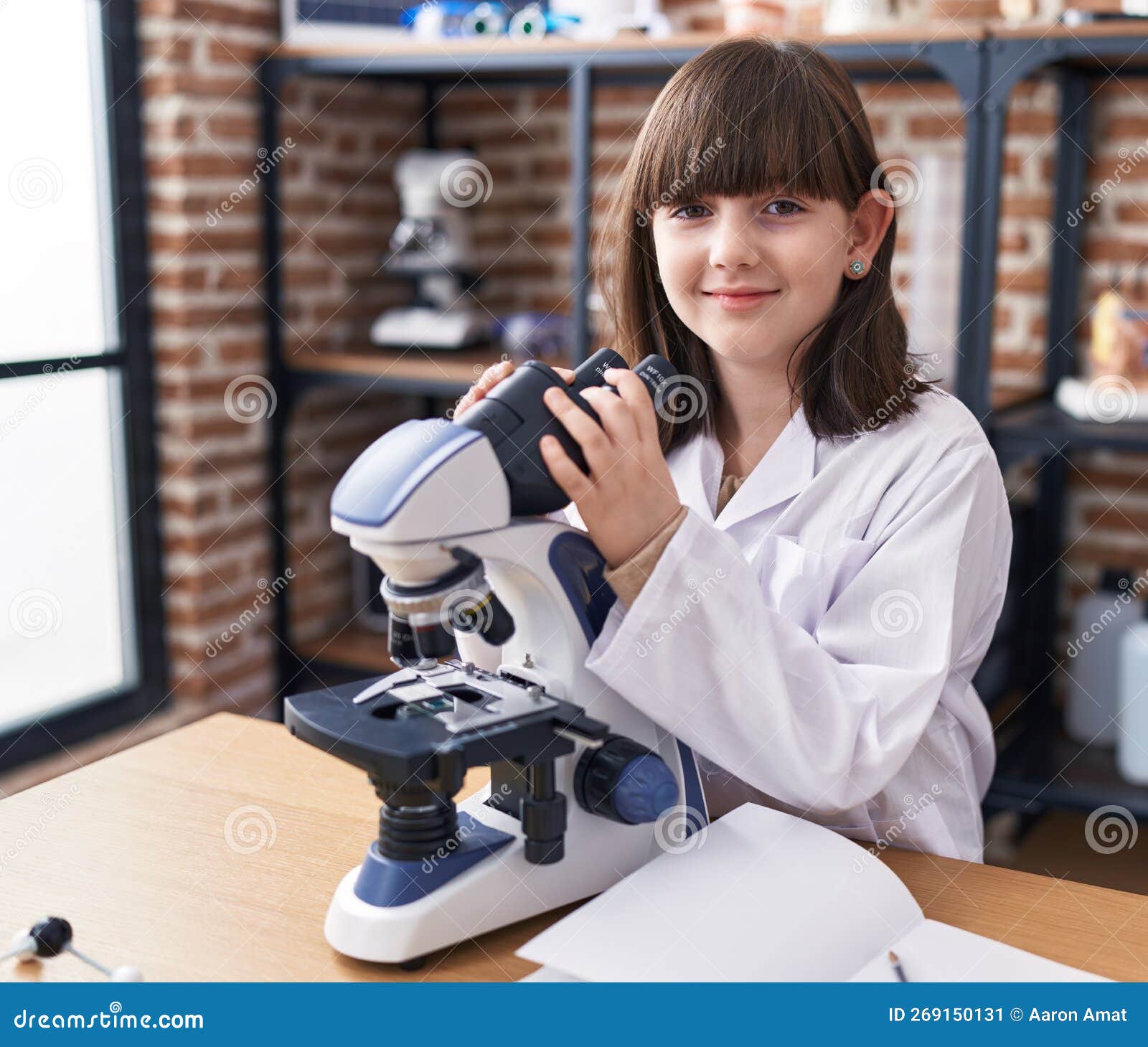 Adorable Hispanic Girl Student Smiling Confident Using Microscope at ...