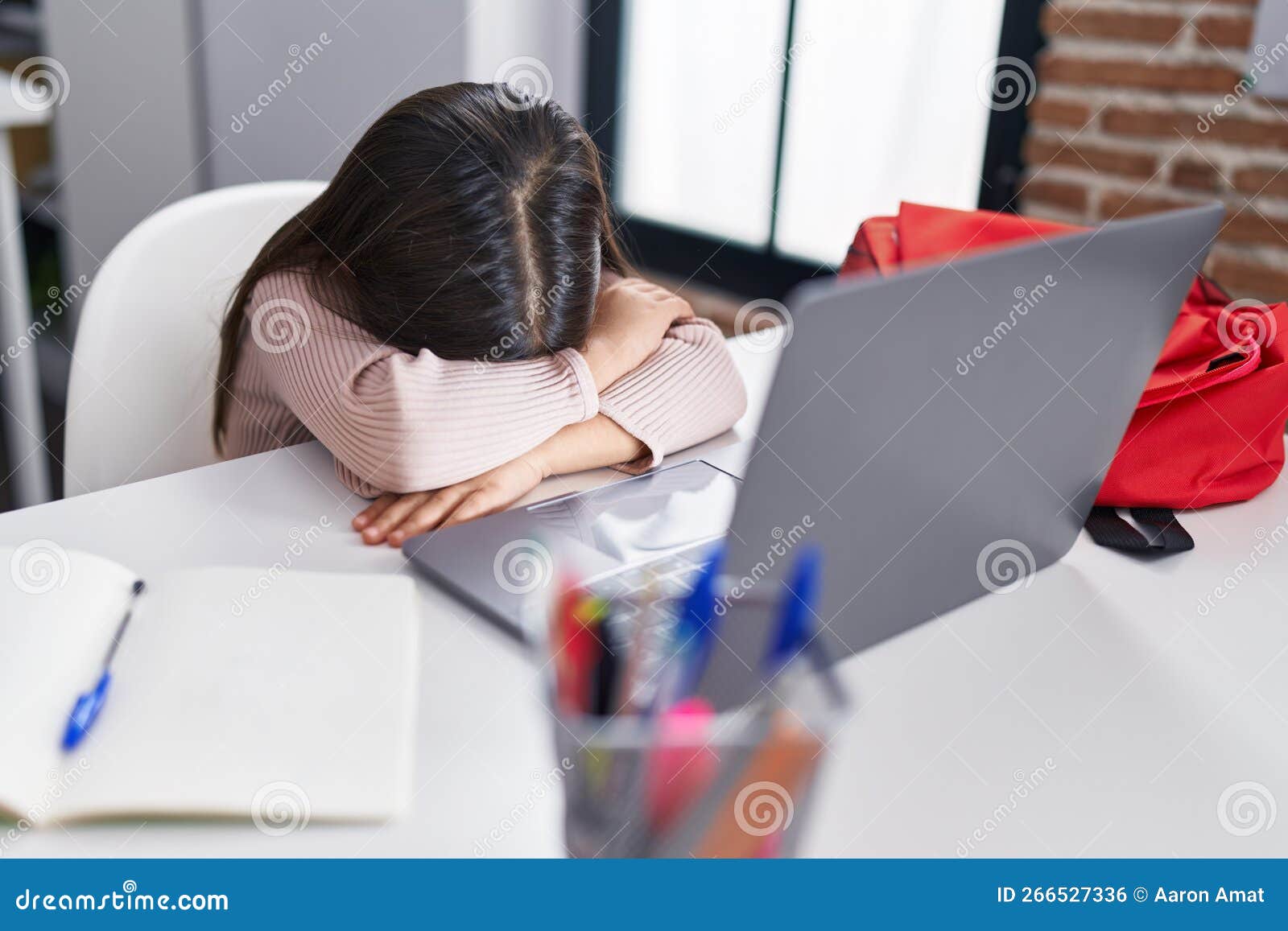 Adorable Hispanic Girl Student Using Laptop with Stressed Expression at ...