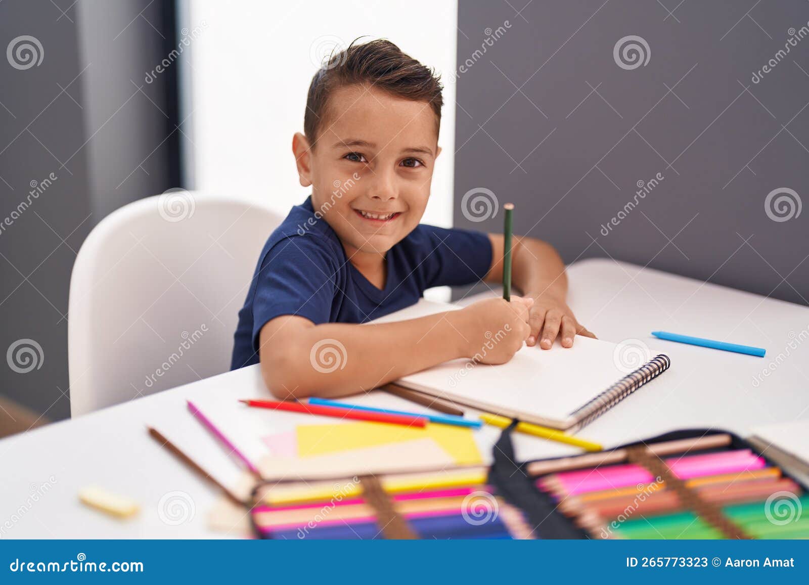 Adorable Hispanic Toddler Student Smiling Confident Drawing on Notebook ...