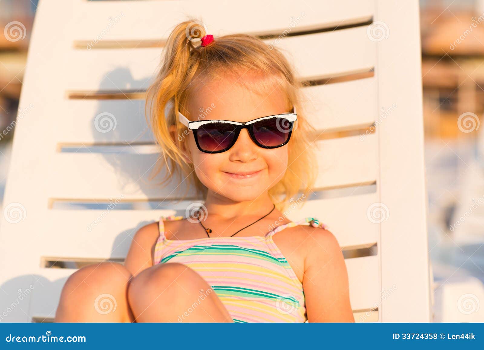 Adorable Kid Sunbathing on a Beach Stock Photo - Image of holiday ...