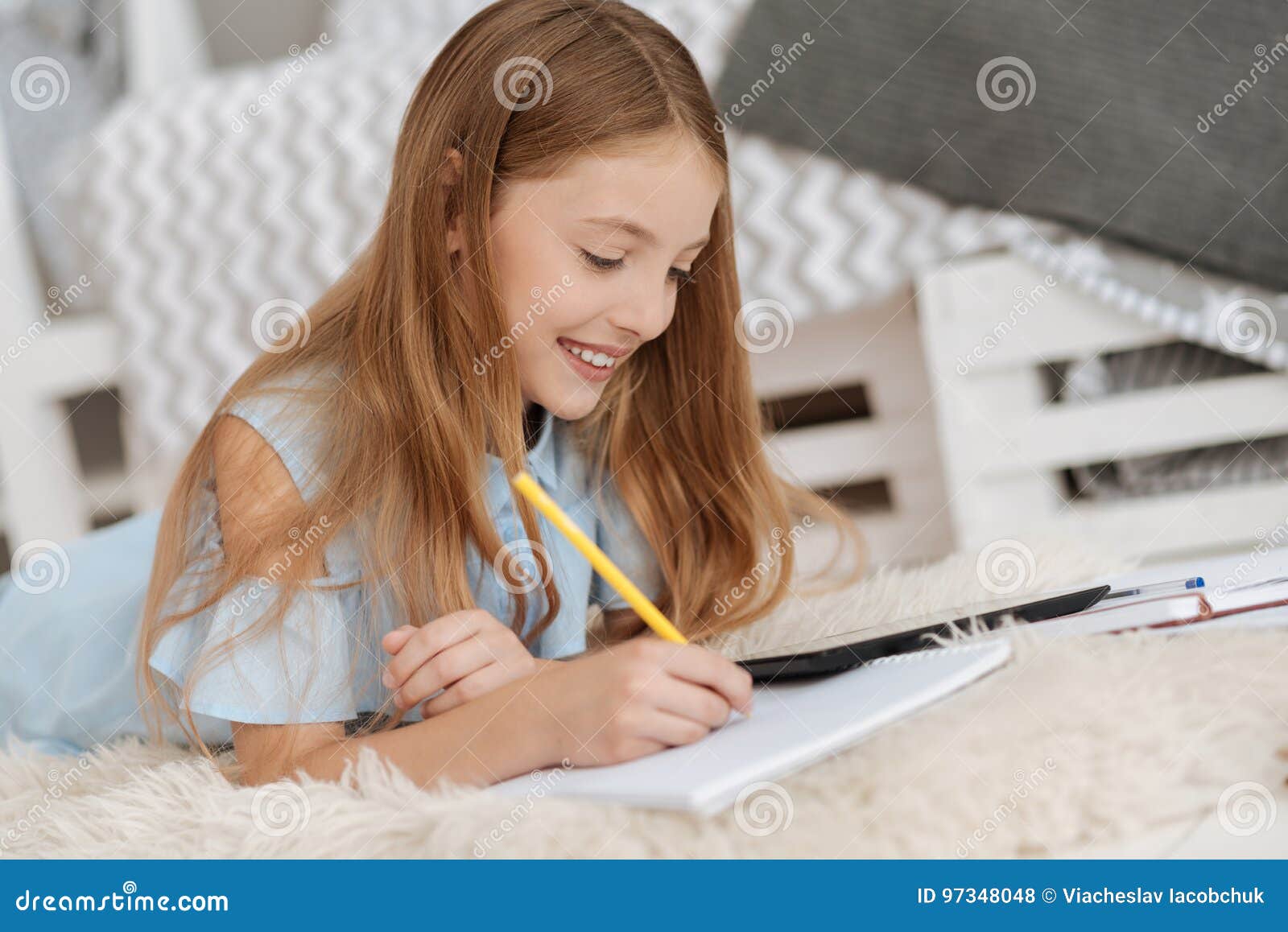 Adorable Kid Writing in Notebook while Studying at Home Stock Photo ...